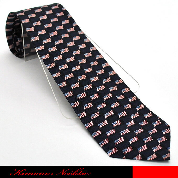 商品説明オールアメリカの国旗が入った美しいネクタイです。ベース地は地模様の入ったネイビーの詩ry区素材です。サイズ・素材【素材】シルク100％【サイズ】大剣幅：約9．5cm　【全長】約142cmark necktie オールアメリカの国旗が...