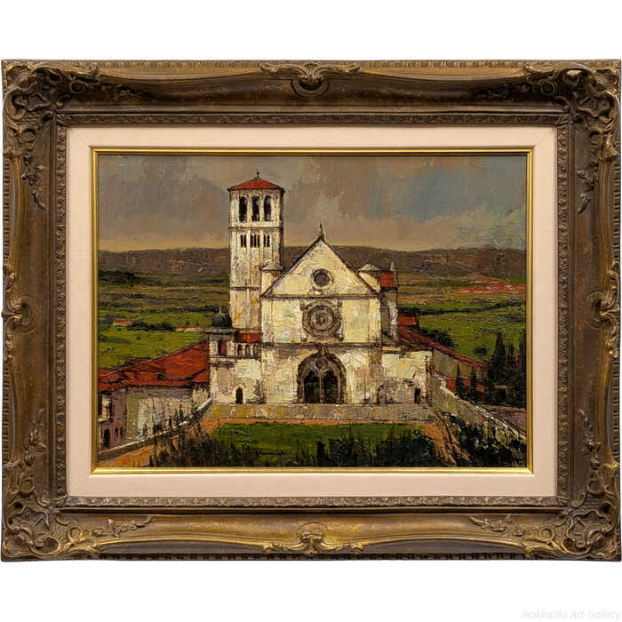 丘の斜面に建つ白亜の教会が、力強い筆致で描かれ、その存在感が印象的です。異国情緒あふれる風景は、見る者の心に穏やかな感動をもたらします。イタリア・ウンブリア州アッシジにあるサン・フランチェスコ大聖堂。カトリック教会の巡礼地として非常に重要な...