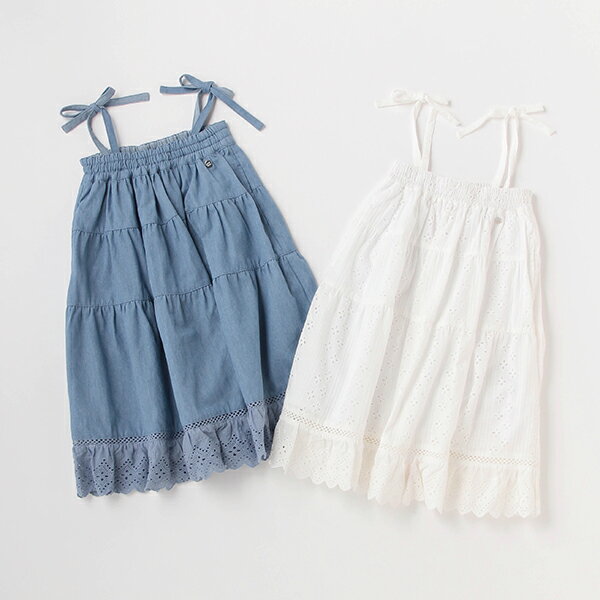 [型番:9622119]トレンドのティアードで可愛いシルエットを描いたスカートです。穴抜きしたレースをまとい、フェミニンな表情をプラスしました。肩紐はお好みでつけ外せるため、ウエストではいてもワンピース風にも着用可能です。オフホワイトは裏地...