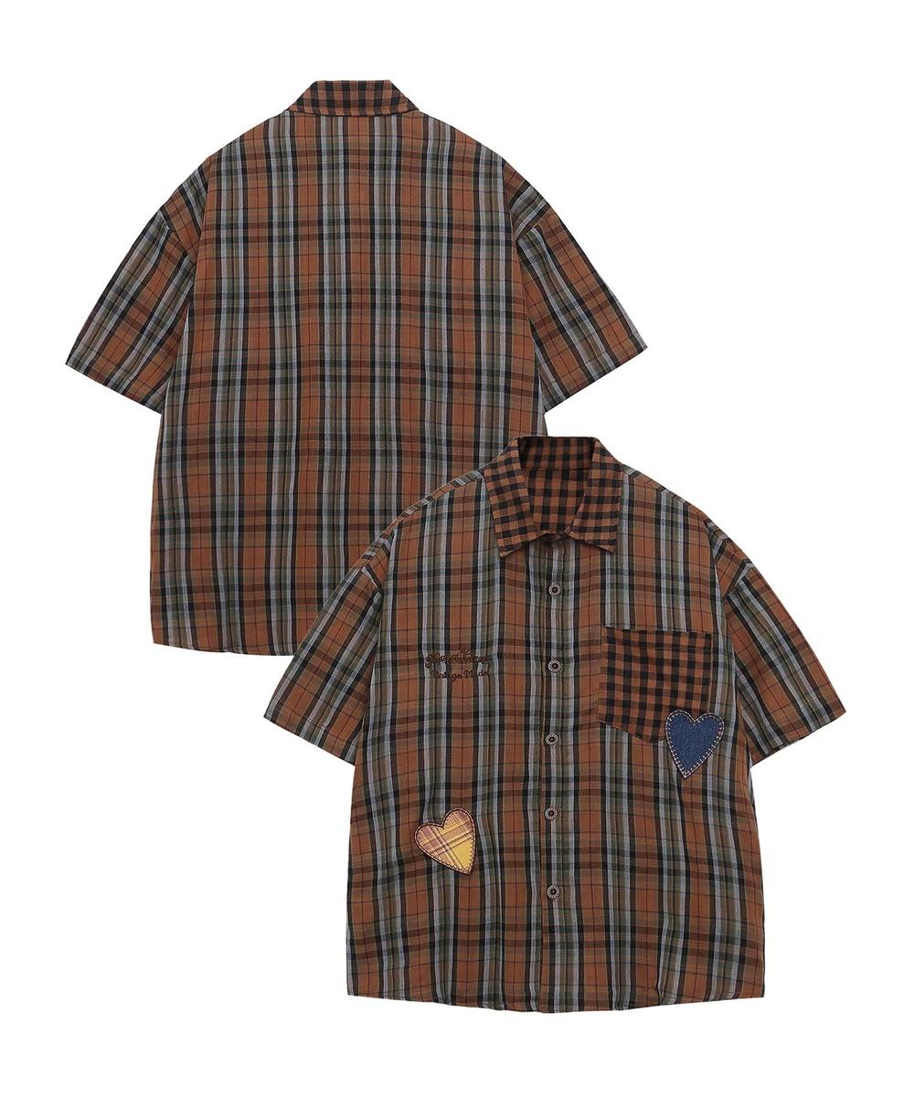 [型番:insc5625a]クラシックなチェック柄に、ハートワッペンをアクセントとして施した個性的な半袖シャツ。ゆったりとしたシルエットで、リラックス感のあるカジュアルな雰囲気。胸元には繊細な刺繍が施され、ディテールまでこだわったデザイン。...