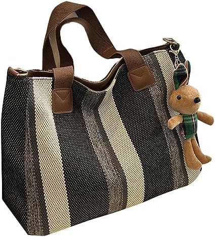 【ストライプ柄 キャンバス素材 レディース トートバッグ｜大容量でおしゃれな2WAYショルダーバッグ】 大容量で多機能なレディース向けトートバッグ。ストライプ柄が可愛く、カジュアルな装いからオフィススタイルまで幅広くマッチします。通勤、通学...