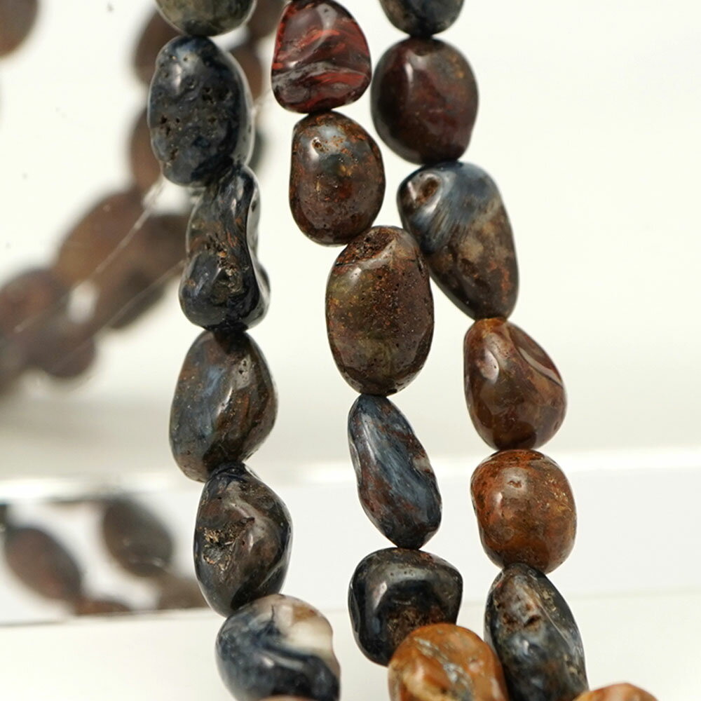 天然石名：ピーターサイト 天然石英名：Petersite 商品形状：連売り ビーズ径 10×8×6-7×6×5mm 約38cm ※ビーズ径 カットの種類により一定ではない場合があります。 カラー：モニターの発色具合によって実際のものと色が異...