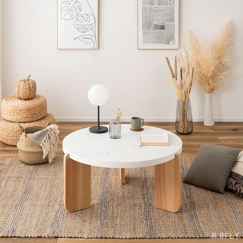 大理石調天板と天然木を組み合わせたラウンドテーブル 優しい色味と角の丸いフォルムが特徴的な、シンプルで落ち着いたラウンドテーブルです。 大理石調の天板と、天然木の脚部は異素材がMIXされたデザイン。 2サイズ展開なので、組み合わせてネストテ...