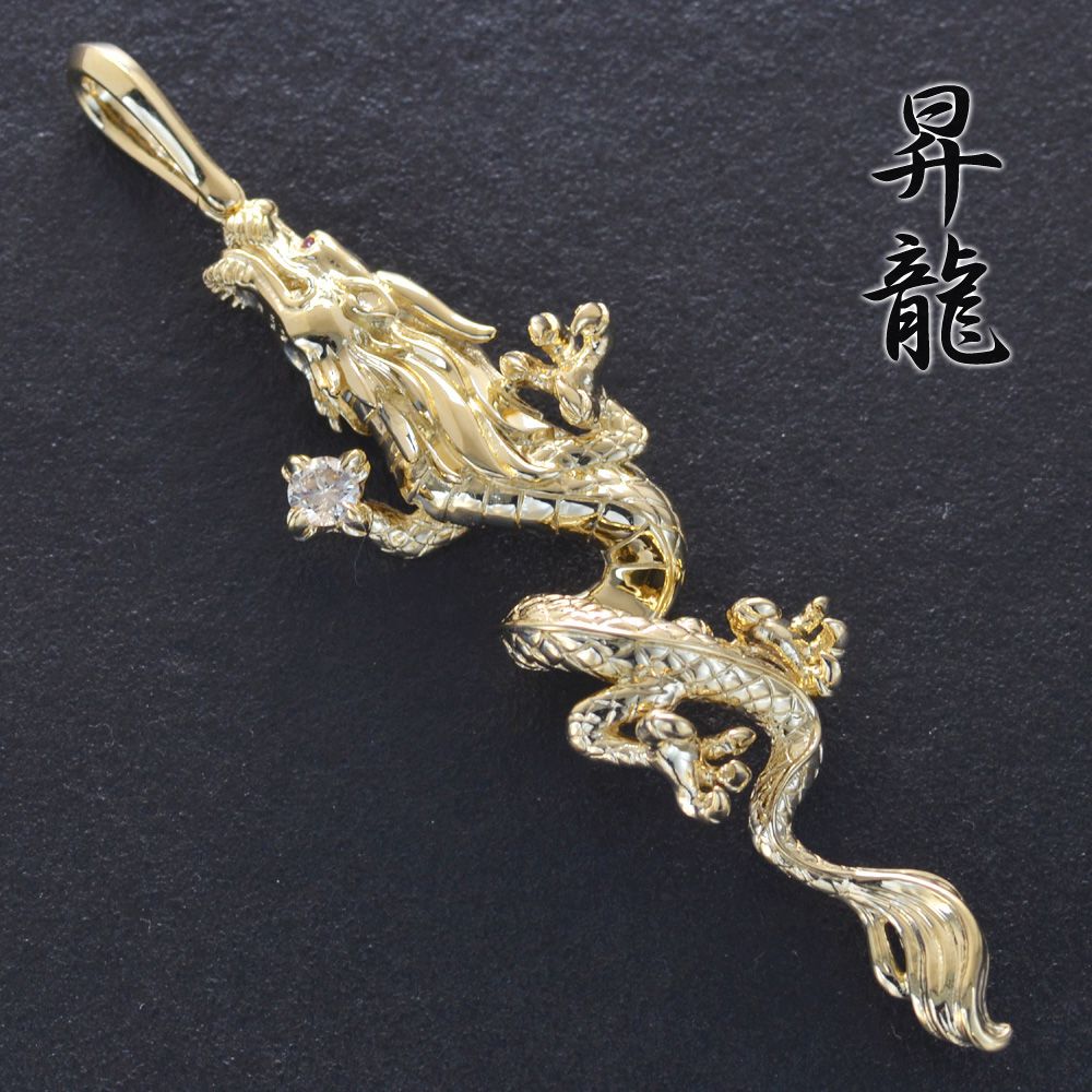 商品番号 DXD00510 使用貴金属 K18（18金イエローゴールド） 刻印有り 使用石 ルビー計0.01カラット 刻印有り ダイヤモンド0.24カラット 刻印有り 総重量 約31g サイズ 横:約22mm 縦約86mm 厚み:約7.7m...