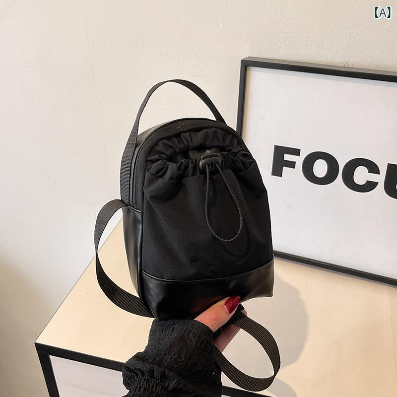 ・カラー展開: ブラック、ホワイト、オレンジ、グリーン・スタイル: アーバンシンプル・主な素材: PU・バッグスタイル: 小方包・バッグサイズ: 中型・装飾: ステッチ・裏地: ポリエステル・形状: 縦型方形・開閉方式: ジッパー・内部構造...