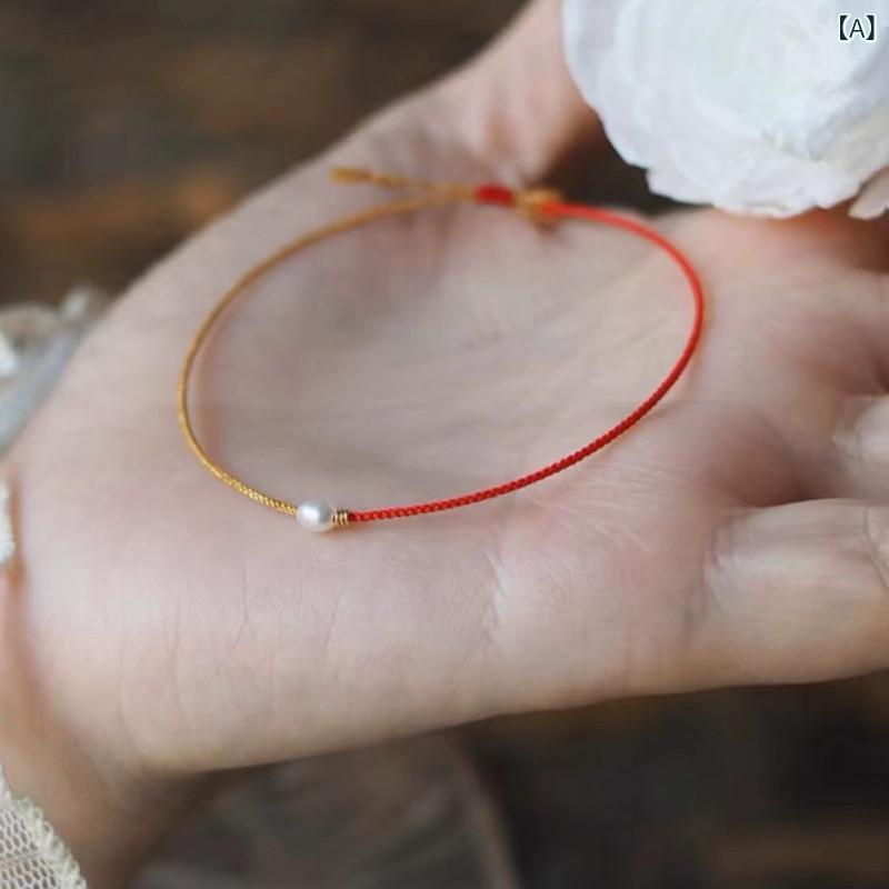 ・カテゴリ: DIY編み込みブレスレット・素材: 糸コード・スタイル: エスニック・デザイン要素: バイカラー、国潮・カラー展開: レッド（天然パール）、ブルー（天然パール）・対象: ユニセックス・加工技術: ハンドメイド