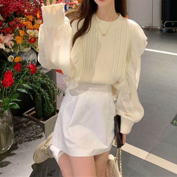 ドッキングデザインが目を惹くトップス。サイドにあしらったボリュームのあるフリルとバルーンスリーブが魅力。カジュアルからフェミニンまで様々なスタイルにマッチする1枚です。色展開 ベージュ ブラック ピンクサイズ フリーサイズサイズ(cm)フリ...