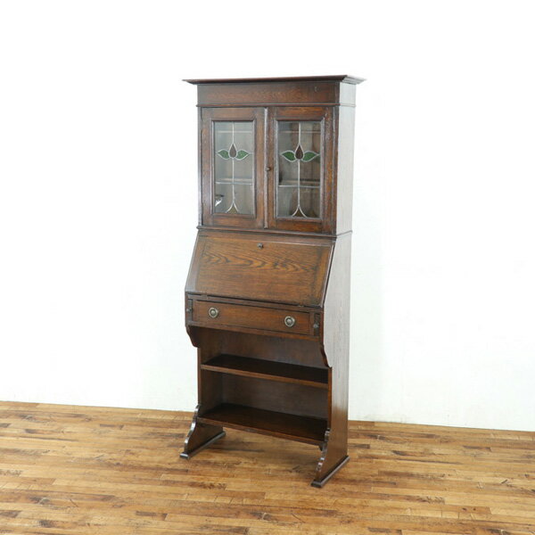 品番 80535 品名 ブックビューロー 原産国 イギリス 材質 オーク材 年代 1920年頃 サイズ 幅：79cm　奥行：33.5cm(拡張時59cm)　高さ：174cm(デスク高73.5cm) 商品について ライティングビューローとブッ...