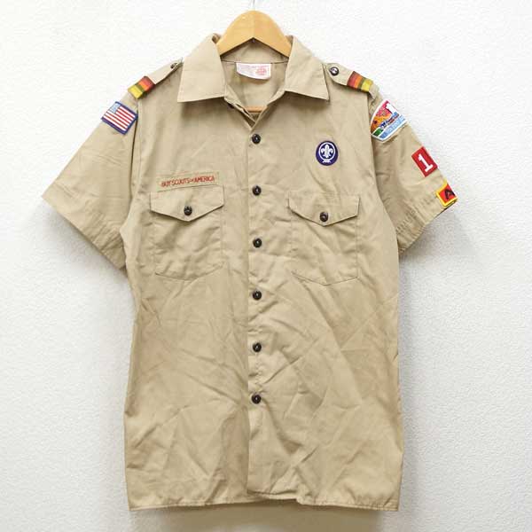 実物 ボーイスカウトシャツ BOY SCOUTS OF AMERICA ポケットが両胸にあり、ワッペン多数付きです。 MADE IN U.S.A.(アメリカ製) 【素材】コットン35%、ポリエステル65%　 中古品になりますが、特に問題のな...