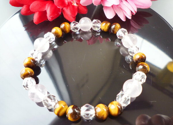 　 商品説明 　金運アップの効果があるとされるタイガーアイと女性らしさを 　高めるローズクォーツ、水晶を組み合わせた 　働く女性にもおすすめのブレスレットです。 使用石 　タイガーアイ6mm丸玉・ローズクォーツ8mm丸玉・カット水晶6mm ...