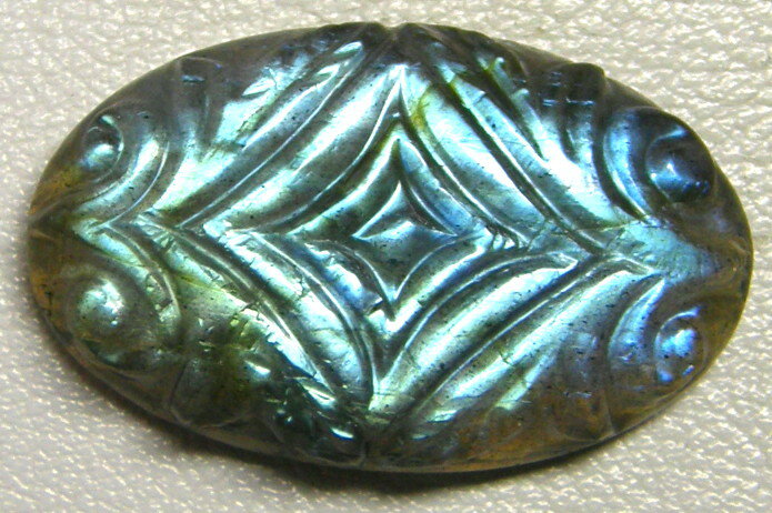 宝石名 天然ラブラドーライト 産地 アフリカ産 重さ 27.61ct サイズ 28x17x7ミリ 商品説明 カービン 彫刻品 ラブラドライト。 発送 簡易書留郵便も対応しています。重さにより価格変わります。基本430円