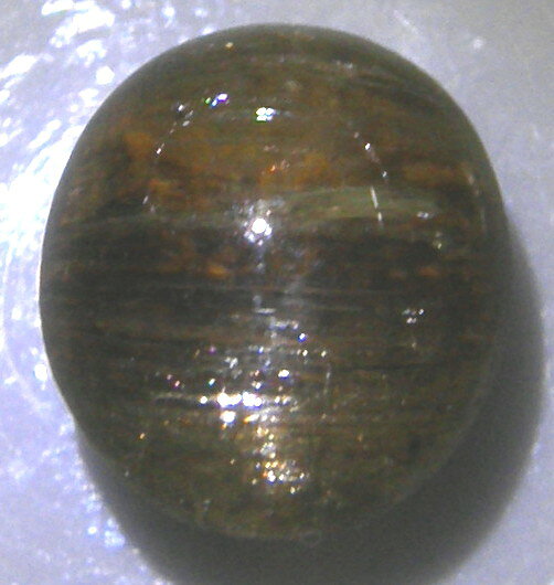 宝石名 天然ルチルクォーツ キャッツアイ 産地 ブラジル産 重さ 5.61ct サイズ 10.3x8.3x8.1ミリ 色 イエローブラウン色 商品説明 キャッツ効果 ルチルクォーツ。 発送 簡易書留郵便も対応しています。重さにより価格変わります。