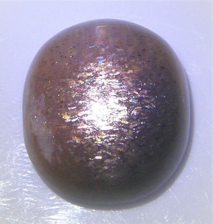 宝石名 天然 アイオライトサンストーンスター 産地 　マダガスカル産 重さ 　11．85ct サイズ 　16x14．2x6．8ミリ 色 　オレンジ/青紫色 商品説明 　パティーカラー　アイオライトとサンストーン混合石　クロス十字スター効果 ...