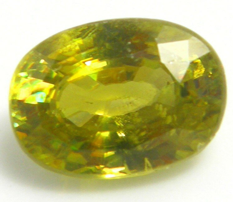 宝石名 天然　スフェーン 産地 　マダガスカル産 重さ 　3．03ct サイズ 　10．1x7．4x5．1ミリ 色 　イエローグリーン色 商品説明 　ペンライト照明などで照らすとキラキラとファイヤー効果あり　小キズあり3カラットUP。 発送...