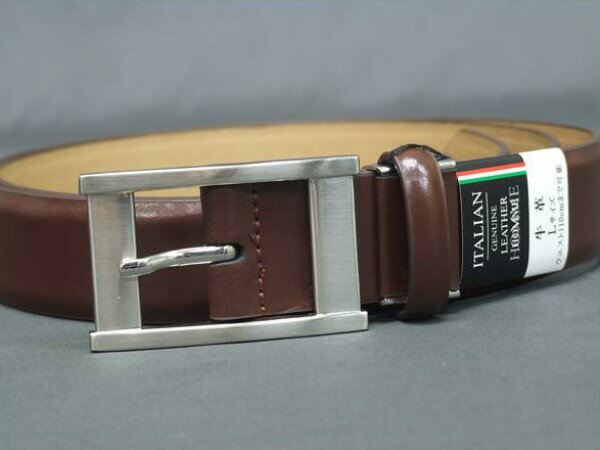 イタリアンレザー使用 ■牛革ビジネスベルト■ 商品詳細 内容 牛革メンズベルト イタリア製牛革使用 色 チョコ茶 柄 無地 スムースレザー（艶あり） 素材 表：牛革／裏：合成皮革（豚革風） 形状・仕様 バックル（大）　　5穴ステッチなし バ...