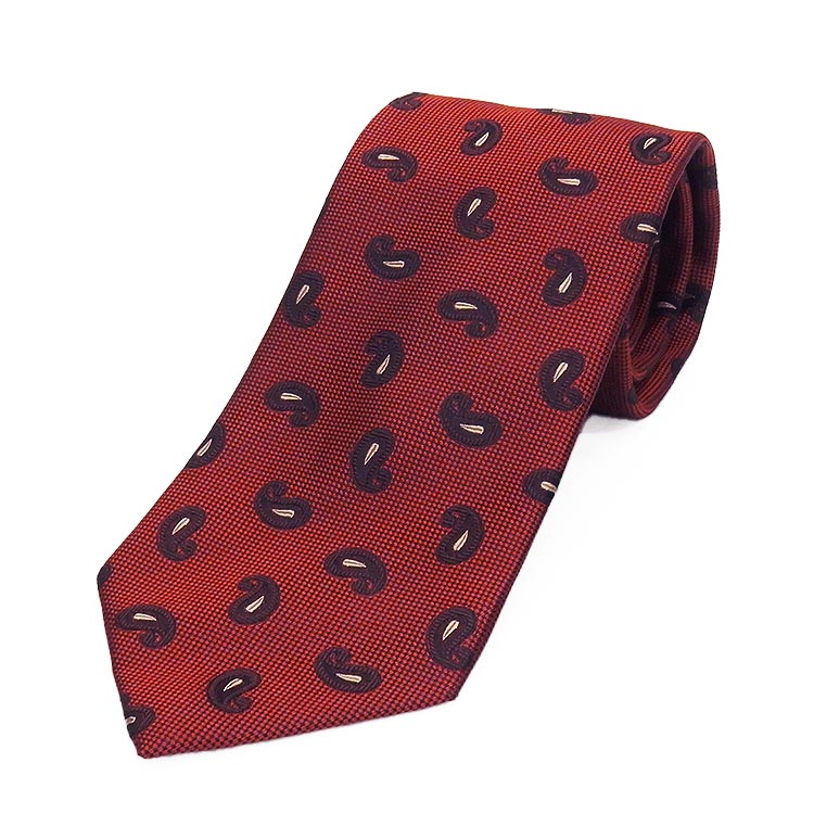 Executive●Tie タテ糸ヨコ糸をあまく撚糸し、低速度で丁寧に 織り上げることにより、絹鳴りのする生糸本来の 自然の柔らかさ・風合い・光沢を損なわない 高品質の生地を使用しました。 縫製は伝統ある京都で本手縫い加工で 仕上げています...