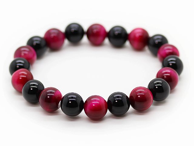 4Aランク高級天然石のピンクタイガーアイ10mmとオニキス10mmを交互に合わせたシンプルなブレスレットです。 落ち着いたデザインで作りましたのでセカンドブレスレットとして2個以上はめる人にもおすすめです！！ ■材質 ピンクタイガーアイ 1...