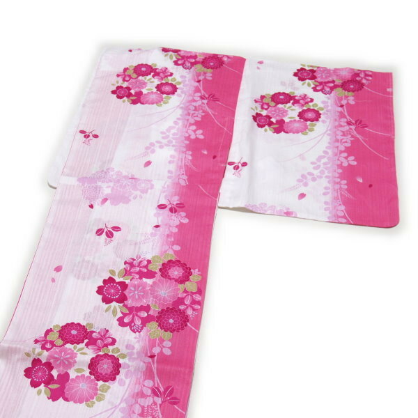 浴衣の着方解説付き着心地のよい高級変り織浴衣です。可愛らしさをアピールしたい方向けの色柄。【色柄】地色は濃いピンク色と白の染め分け。可愛らしい赤い花輪柄。【サイズ】フリー　身丈165cm　裄67cm　袖丈49cm　適応身長：155cm〜16...