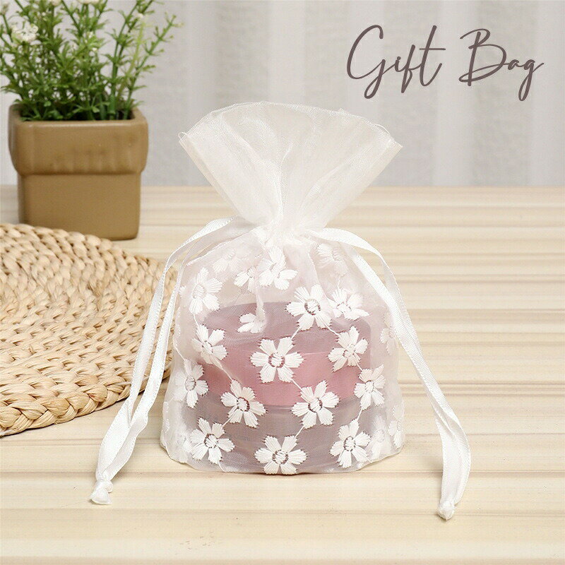 花柄デザインのギフトバッグ(単品)。可愛いデザインなのでギフト用ラッピングとしてはもちろん、小物入れにもおすすめです♪ 【サイズについて】画像をご参照ください。 【カラーについて】生産ロットにより柄の出方や色の濃淡が異なる場合がございます。...