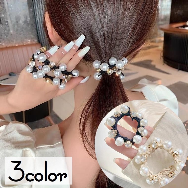 フェイクパールとラインストーンがきらめくレディース用ヘアゴムです。お出かけなど普段使いはもちろん、ちょっとしたお呼ばれにも◎3種類のカラーからお選びください。 【サイズについて】ワンサイズ 【カラーについて】生産ロットにより柄の出方や色の濃...