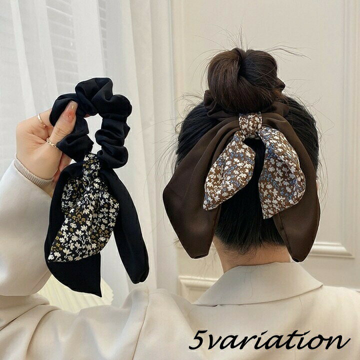 サテン調のロングリボン付きがおしゃれなシュシュです。ヘアアレンジのアクセントに◎ 【サイズについて】画像をご参照ください。 【カラーについて】生産ロットにより柄の出方や色の濃淡が異なる場合がございます。お使いのモニターや撮影時の光の加減など...