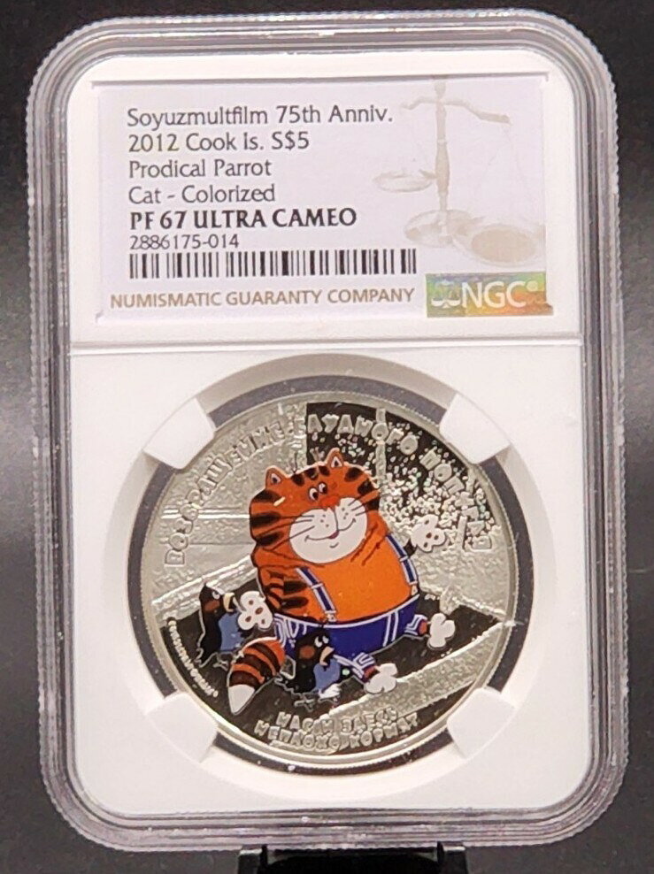 PRODUCT DETAILS 【商品情報】・鑑定機関: NGC・グレード: PF67 Ultra Cameo・発行年・発行国: 2012年・クック諸島・額面: 5ドル・テーマ・シリーズ: ソユーズムリトフィルム 75周年 放蕩息子のオウム...