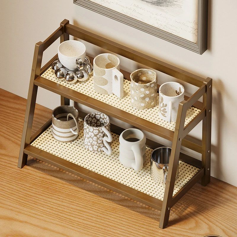 製品説明： この多層式卓上カップ収納ラックは、コーヒーカップ、ティーカップ、マグカップ専用に設計されており、ご家庭やオフィスに最適です。ミニマルでモダンなデザインは、軽やかで高級感のあるスタイルと洗練された美しさを兼ね備えています。飲み物の...