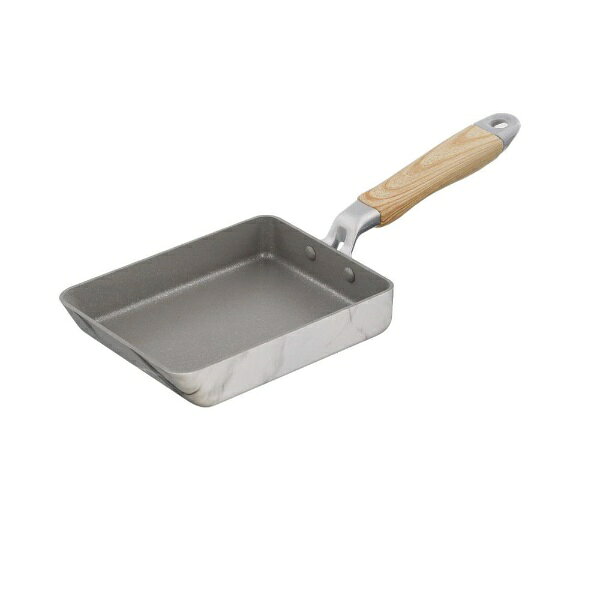 上品な大理石模様が美しい卵焼き器です。耐久性に優れたシルバーマーブル加工の内面は、耐摩耗性試験100万回クリア。握りやすい木目調ハンドルはシリコーン塗装で仕上げられています。ガス火専用です。