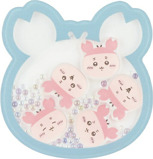 スマートフォンの背面に貼り付けるアクセサリです。フェイスデザインのなかにあるアクリル＋ビーズがシャカシャカうごく！■サイズW56mm×H59mm■・スマートフォンの保持のサポートに！・スタンドとしても使用可能です！・フラットなので日々の使用...