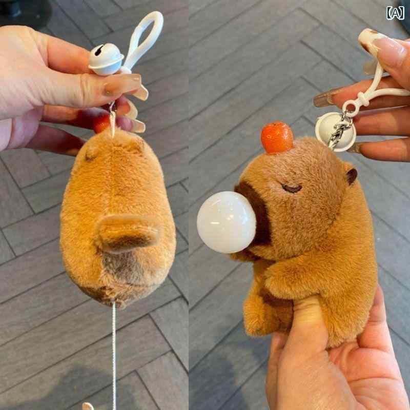 ・カテゴリ: ぬいぐるみ・形状: 植物・主な素材: 超柔短ボア素材・機能: 音楽・発声・カラー展開: 吐泡泡鈴付きカピバラ、吐泡泡尻尾振り鈴付きカピバラ、吐泡泡カピバラ、尻尾振りカピバラ、カピバラぬいぐるみ・高さ: 12cm・対象年齢: 7...