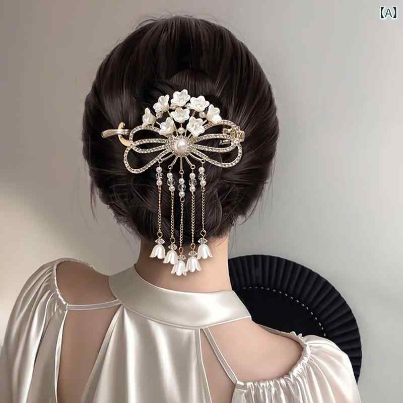 ・カテゴリ: ヘアアクセサリー・スタイル: 清新スイート・種類: 爪クリップ・加工方法: 手作業・対象: 女性・デザイン展開: 蝶結水晶フリンジツイストクリップ、鈴蘭花ツイストクリップ、水晶星ツイストクリップ、金色銀杏葉ツイストクリップ、金...
