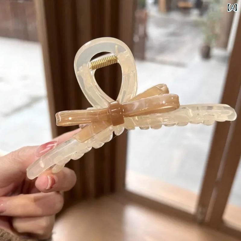 ・カテゴリ: ヘアアクセサリー・タイプ: バナナクリップ・素材: アクリル・加工: 手作り・カラー展開: 米白、咖色、灰色・サイズ展開: 11cm・流行要素: クロス・スタイル: 爽やか可愛い・対象: 女性用