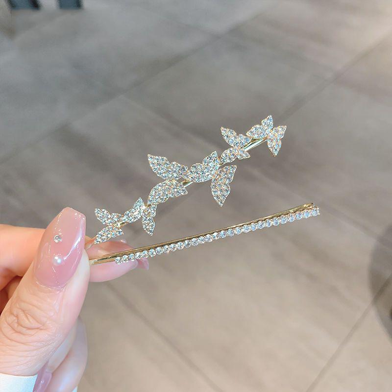 ・カテゴリ: ヘアアクセサリー・種類: 一文字クリップ・主な素材: 合金・加工: ラインストーン・モチーフ: 蝶々・スタイル: シンプル・スタイル分類: 通勤・性別: 女性