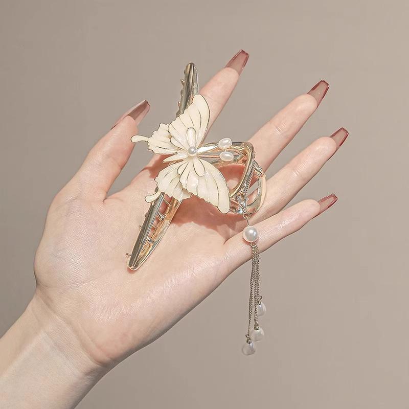 ・カテゴリ: ヘアクリップ・主な素材: 金属・加工: メッキ・スタイル: 中華風・モチーフ: 蝶・装飾: タッセル
