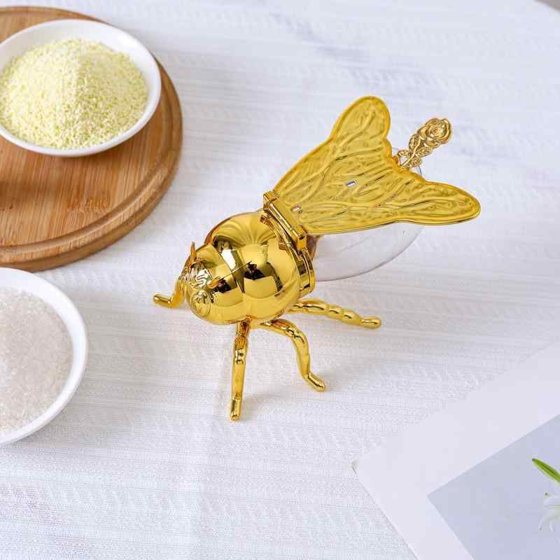 ・カテゴリ: 糖罐・主な素材: プラスチック・調味料タイプ: 固形調味料・カラー展開: ゴールド（ハチ装飾付き）、シルバー（ハチ装飾付き）・スタイル: 現代的、シンプル