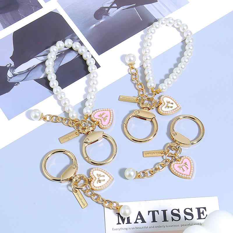 ・カテゴリ: キーホルダー・カラー展開: ピンク、ホワイト・素材: 亜鉛合金・スタイル: キュート風