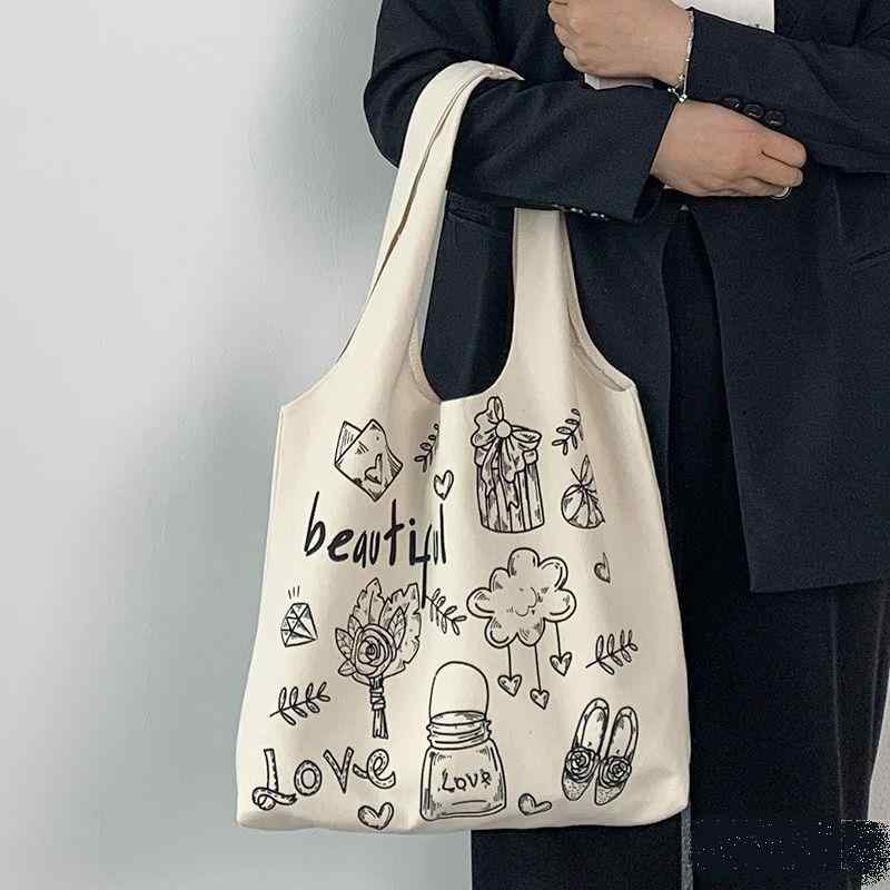 ・カラー展開: ホワイト、ブラック、ホワイト（ベア柄）、ブラック（ベア柄）・スタイル: ストリートカジュアル・主な素材: PU・バッグの形状: トートバッグ・サイズ感: 大きめ・デザイン: プリント・裏地素材: キャンバス・利用シーン: デイリー