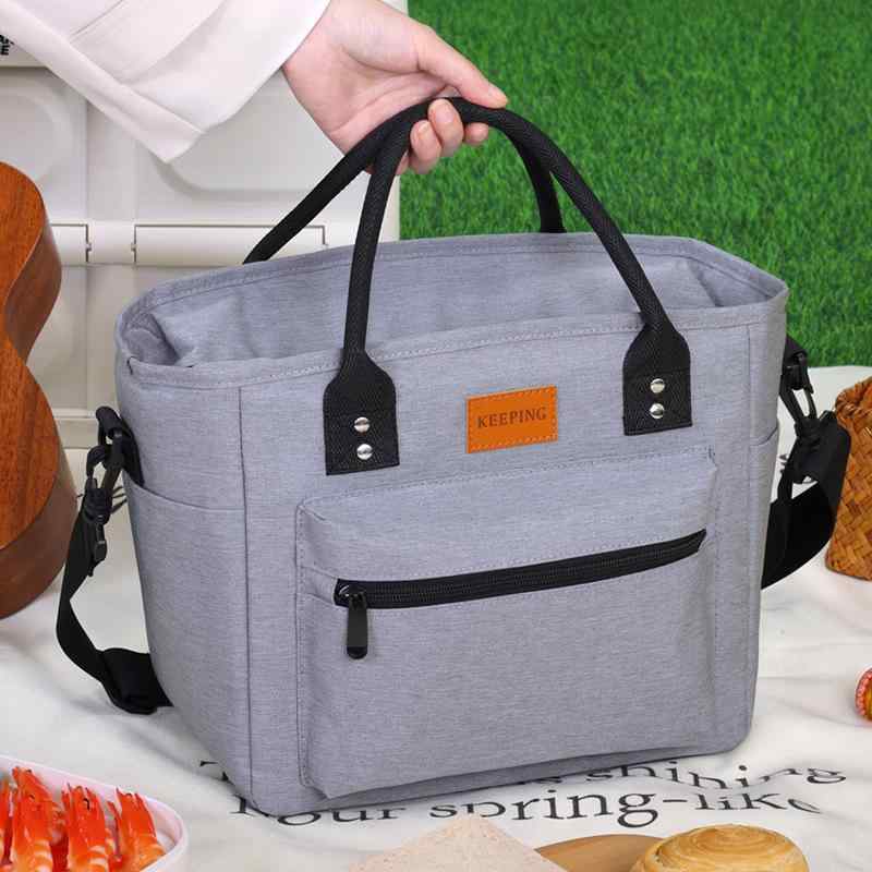 ・カテゴリ: 保冷バッグ・主な素材: オックスフォード布・容量: 10L・カラー展開: グレー、ブラック・スタイル: 現代ミニマル・機能: ポータブル、折りたたみ可能