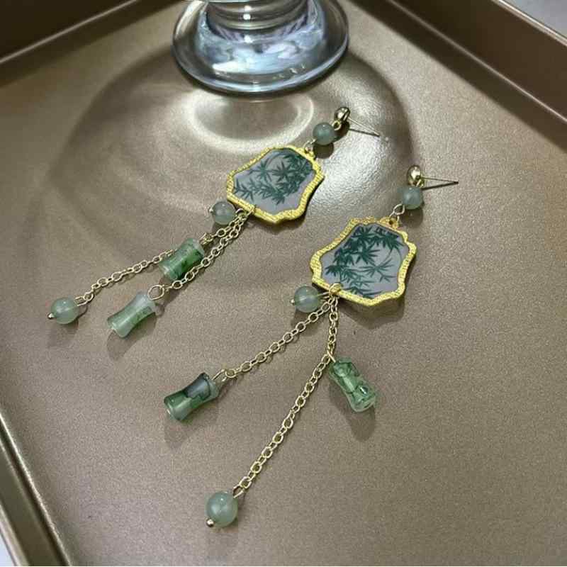 ・カテゴリ: ピアス、耳飾りりり・主な素材: 合金・加工技術: 電気メッキ・デザイン: バショウ扇と竹、折扇と竹、折扇とパール、竹とパール、幾何学模様・スタイル: レトロ、文芸・対象: レディース