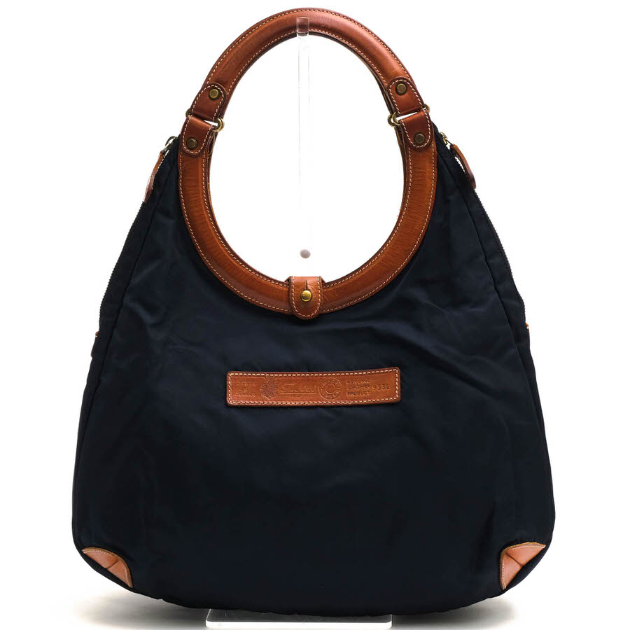 BRANDINGの全商品で利用可↓↓1%OFFクーポン↓↓Felisi / フェリージFelisi フェリージ ハンドバッグ 9332 伊リモンタ社ナイロン バケッタレザー 牛革商品説明1973年に、イタリアのフェラーラで、小さな革工房から...