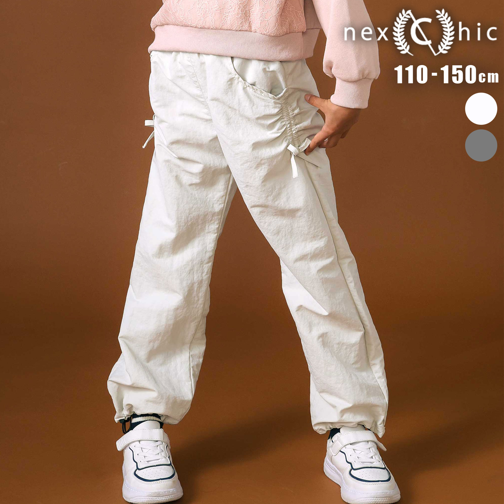 商品名 nexchicサイドギャザーニータックタフタパンツ(110~150cm) 商品番号 1869-78010 商品説明 -25AW-女の子らしい可愛さが詰まったデザインのパンツ。■デザインサイドにたっぷりギャザーを寄せ、その下にリボンモ...