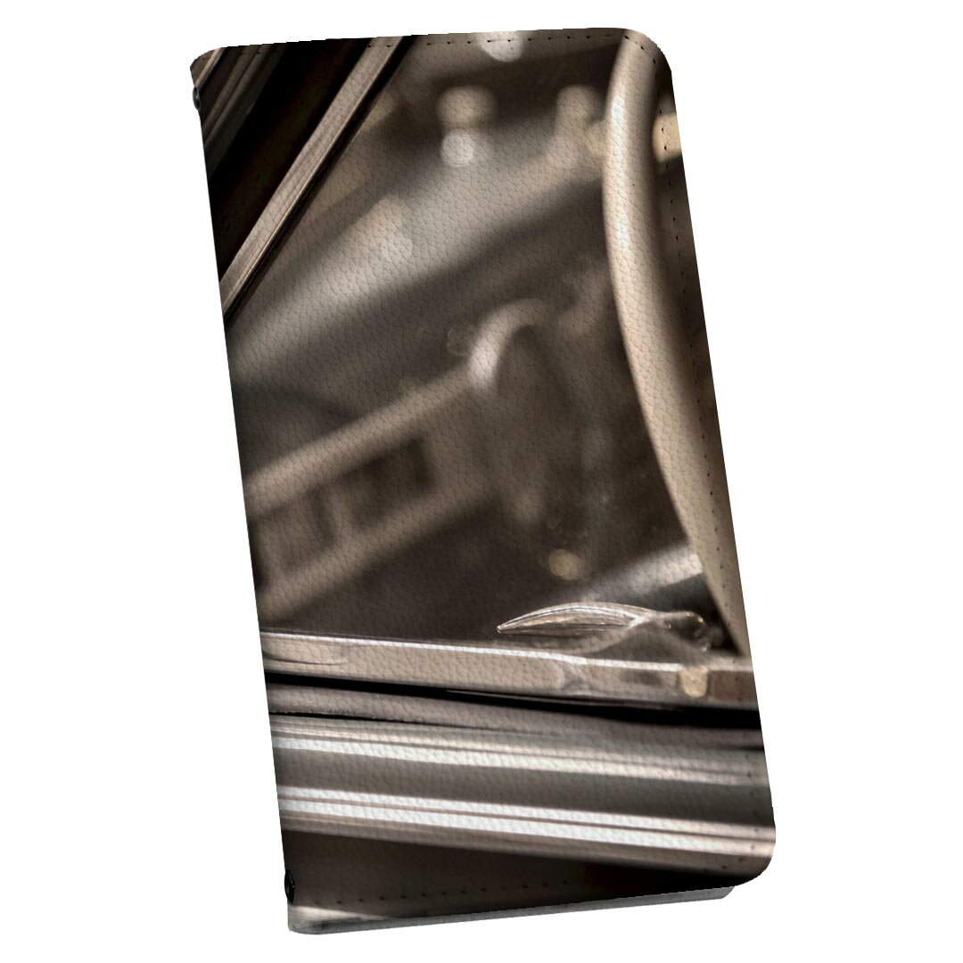 商品特徴・シームレスな全面デザイン（内側は落ち着いたオフホワイト）・外側は高品質の人工革を使用・内側にはスマホを装着するケースが付属・機種専用のカメラホール仕様でケースを装着したままの撮影が可能・ワンセグや動画の視聴に便利な横置きスタンド機...