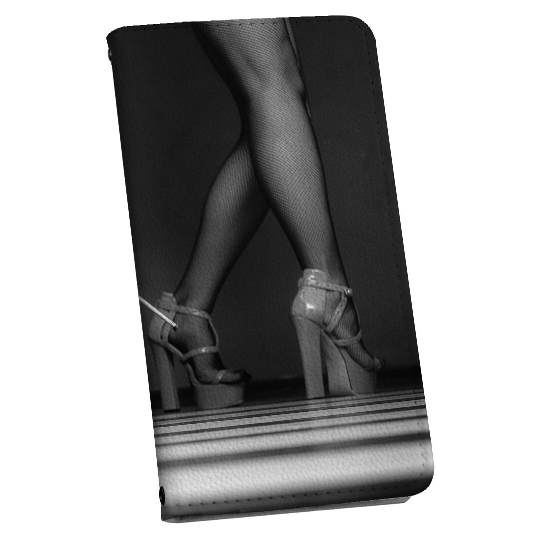 商品特徴・シームレスな全面デザイン（内側は落ち着いたオフホワイト）・外側は高品質の人工革を使用・内側にはスマホを装着するケースが付属・機種専用のカメラホール仕様でケースを装着したままの撮影が可能・ワンセグや動画の視聴に便利な横置きスタンド機...