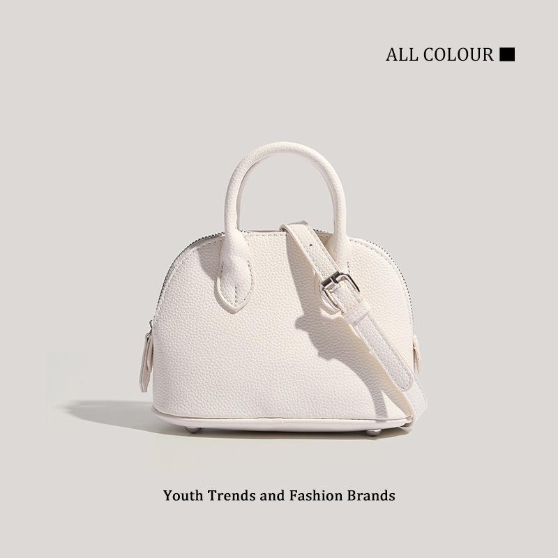 ・カラー: 白色、黒色・スタイル: 都市簡約・素材: PU・タイプ: 貝殻包・サイズ: 小・装飾: 車縫線・裏地: ポリエステル・形状: 貝殻型・開閉: ジッパー・硬さ: 中・ストラップ: 単根・用途: 日常