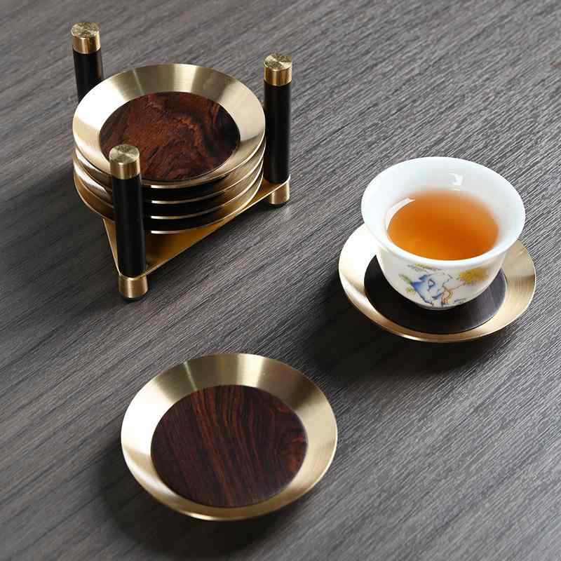 ・素材: 紫光檀、黄銅・色: 紫光檀銅木、巴花銅木・スタイル: 中式、新中式・機能: 防燙、断熱、来客用・特徴: 銅木三角架安定設計・木材: 輸入紫光檀原料