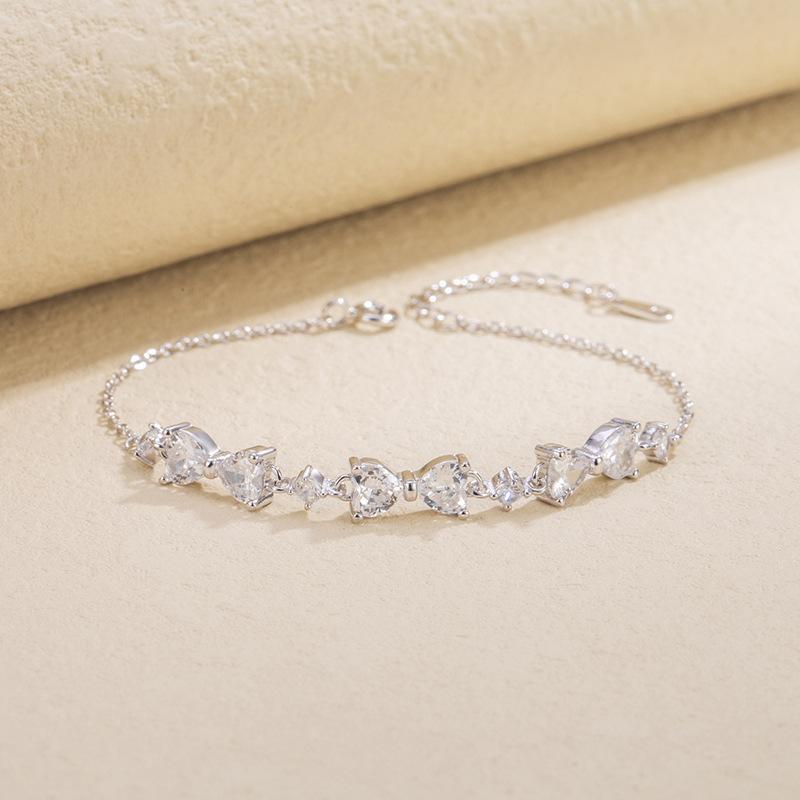 ・素材: シルバー・加工: 精密加工・性別: 女性用・デザイン: 蝶結・カラー: ホワイトゴールド、白石・純度: 999純銀・スタイル: シンプル・スタイル分類: ファッショントゥーコム・流行要素分類: 形状/パターン