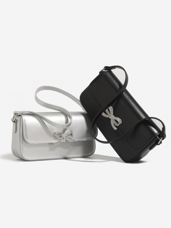 ・カラー: シルバー、ブラック・サイズ: 23×5×12.5cm・スタイル: ストリート・素材: PU・バッグサイズ: 中型・流行要素: 蝶結、ステッチ、ラインストーン、チェーン・裏地: 合成皮革・形状: 横型方形・開閉方式: マグネット・...