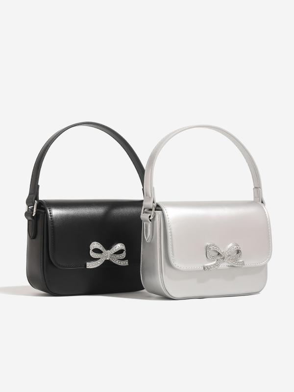 ・カラー: シルバー,ブラック・サイズ: 17x5x12.5cm・スタイル: ストリート・素材: PU・バッグサイズ: 小・流行要素: リボン,ステッチ,ラインストーン,チェーン・裏地素材: 合成革・バッグ形状: 横型方形・開閉方式: マグ...