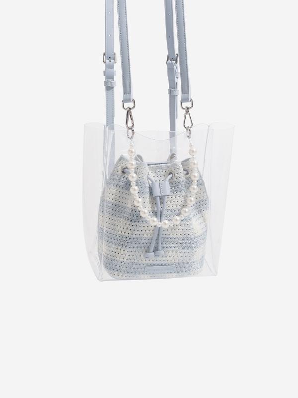 ・色: ライトブルー・サイズ: 17x10x19cm・素材: ポリエステル・バッグサイズ: 中型・裏地: ポリエステル・形状: バケツ型・開閉: 引き紐・内部構造: 携帯ポケット・硬さ: 中程度の柔らかさ・外ポケット: 開口ポケット・ストラ...