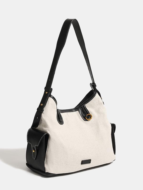 ・カラー: ブラック・サイズ: 32×13×26cm・素材: キャンバス・バッグサイズ: 大型・形状: 横型方形・開閉方式: マグネット・内部構造: ジッパー隠しポケット、スマホポケット、カードポケット、仕切りジッパーポケット・外ポケット:...